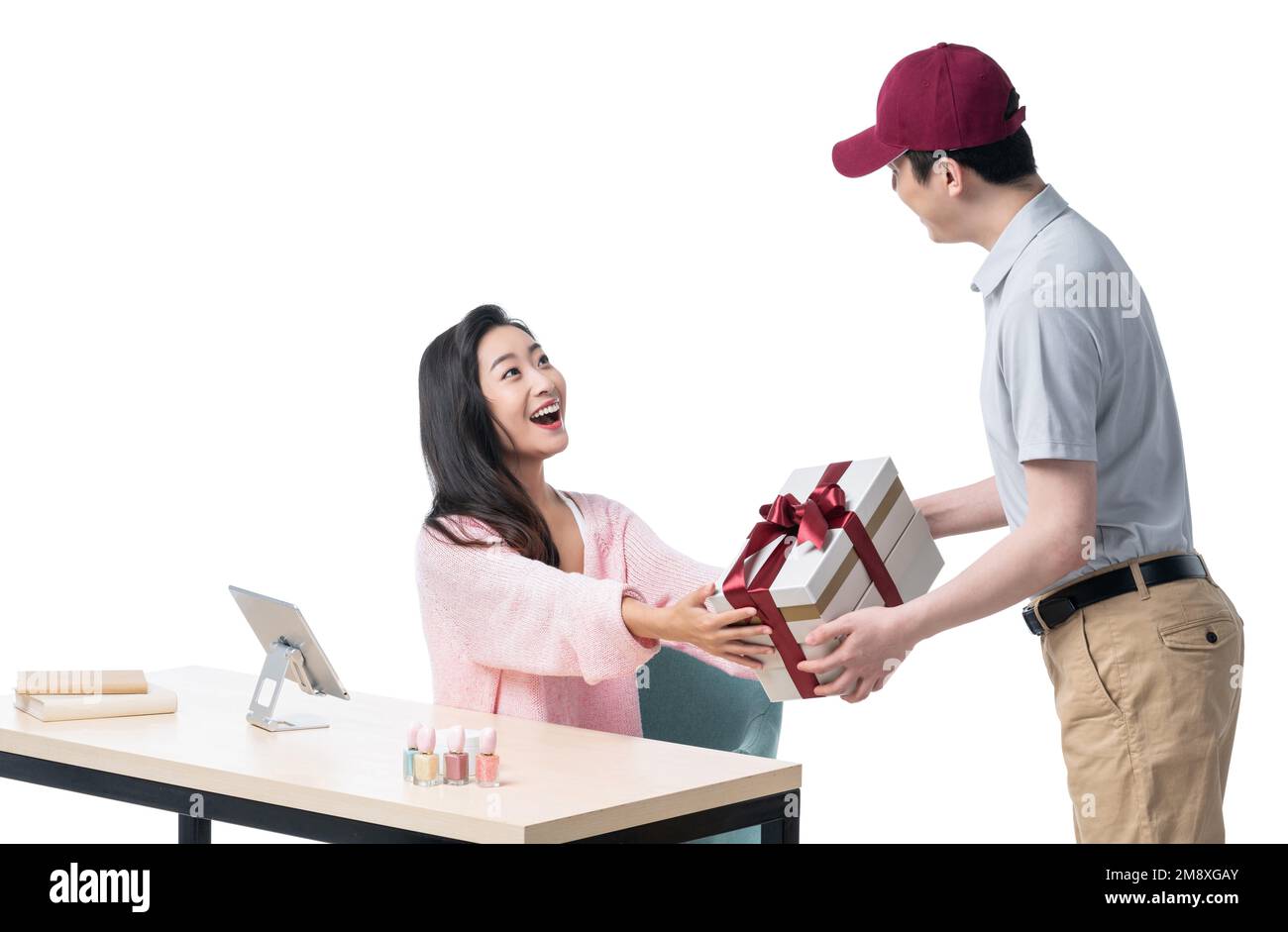 Young woman to sign for a gift Stock Photo - Alamy