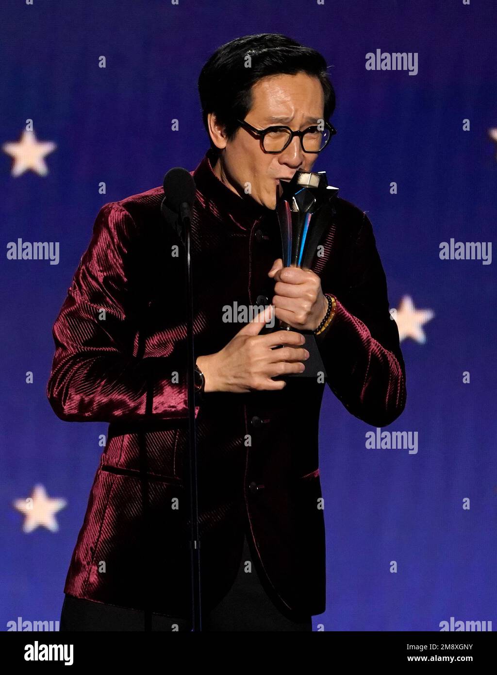Ke Huy Quan accepts the award for best supporting actor for "Everything ...