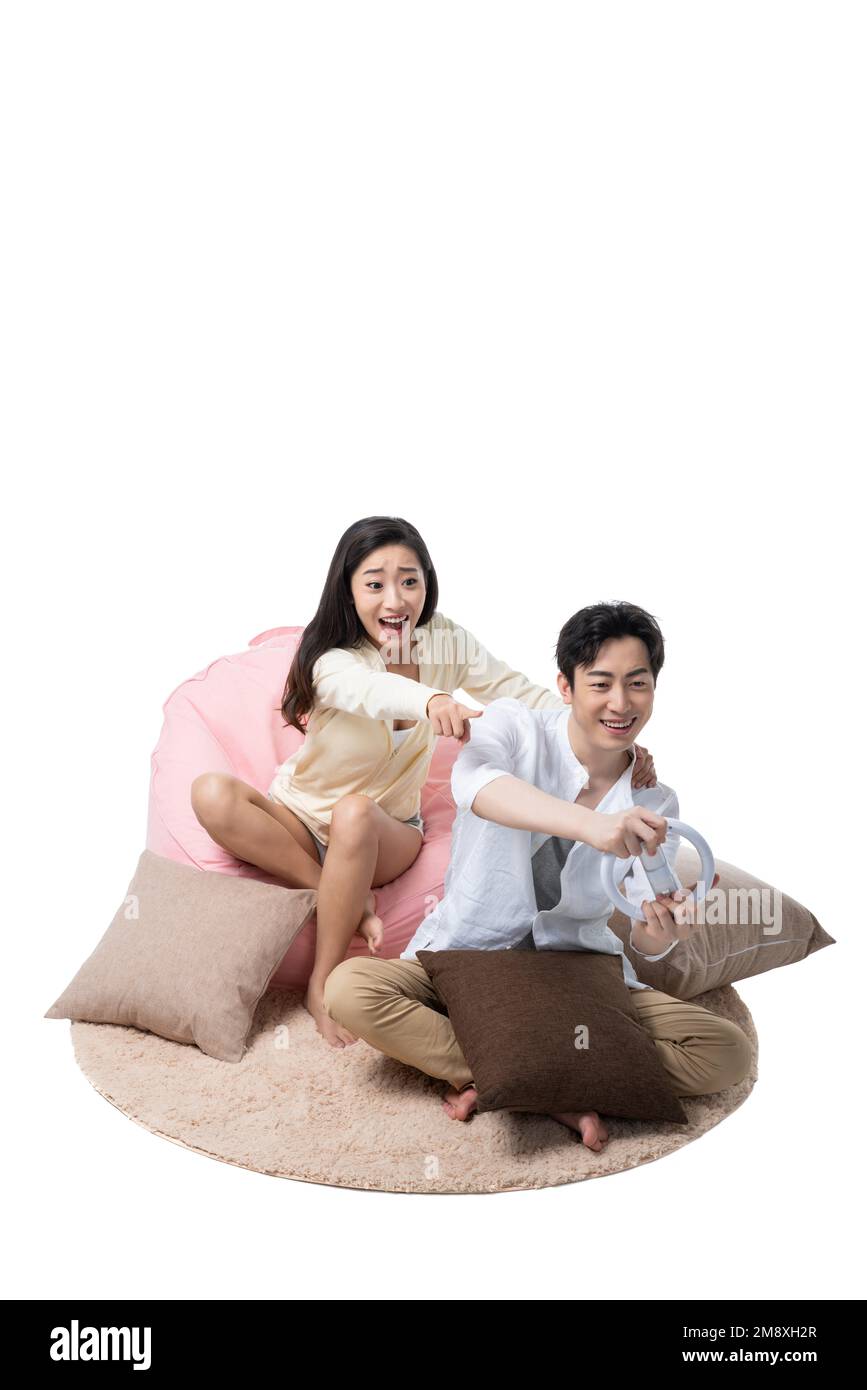 Young couple together playing computer games Stock Photo - Alamy