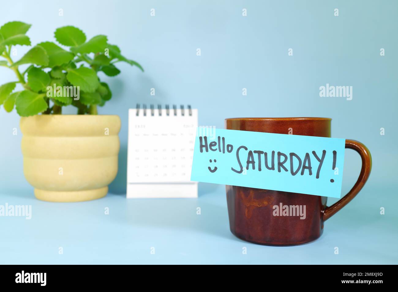 Welcome, hello and happy Saturday concept. Selective focus of coffee ...