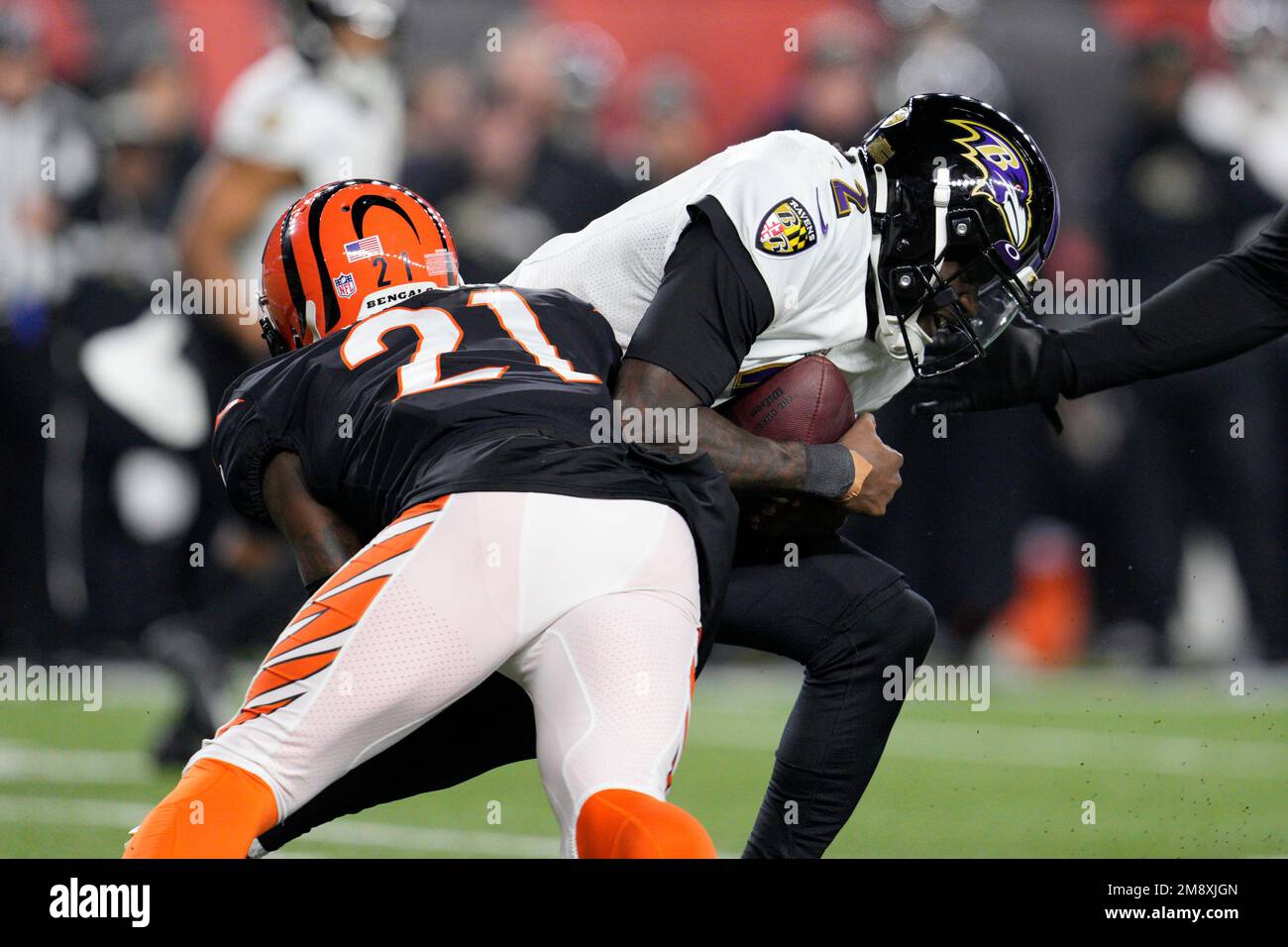Baltimore Ravens quarterback Tyler Huntley (2) is sacked by Cincinnati ...