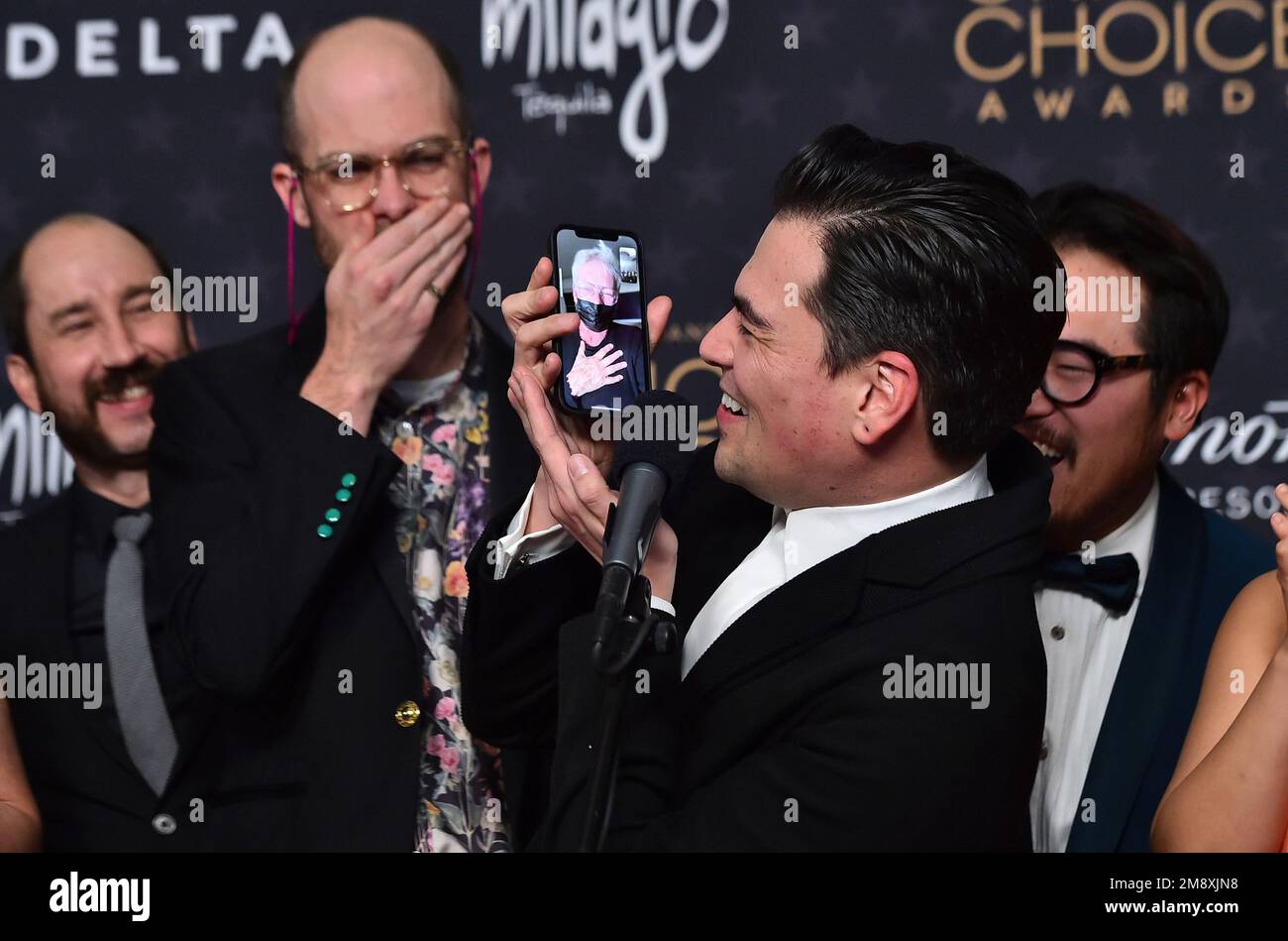 Jamie Lee Curtis appears on a cell phone held by Jonathan Wang, winner ...