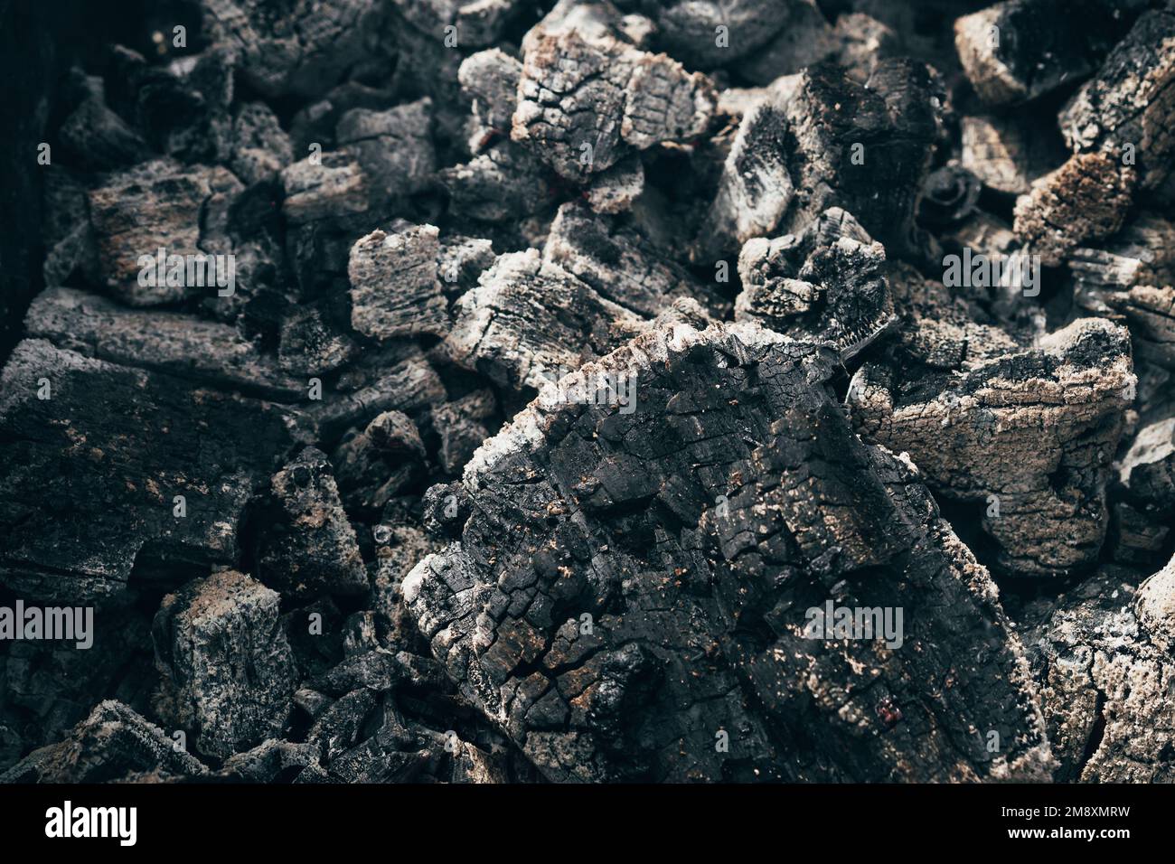 black embers after burnt campfire closeup Stock Photo - Alamy