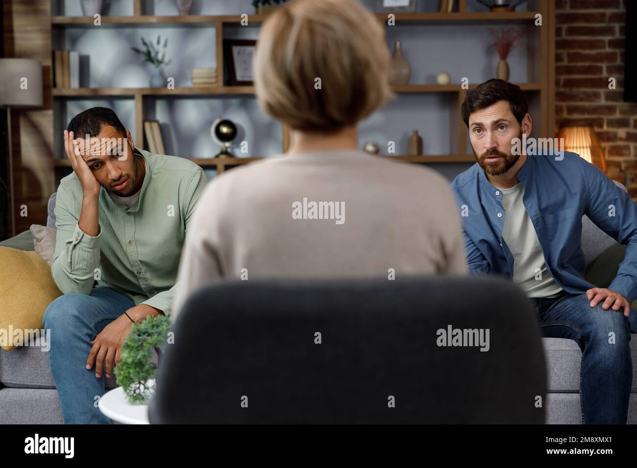 LGBT family at a psychotherapist's appointment. A family psychologist ...