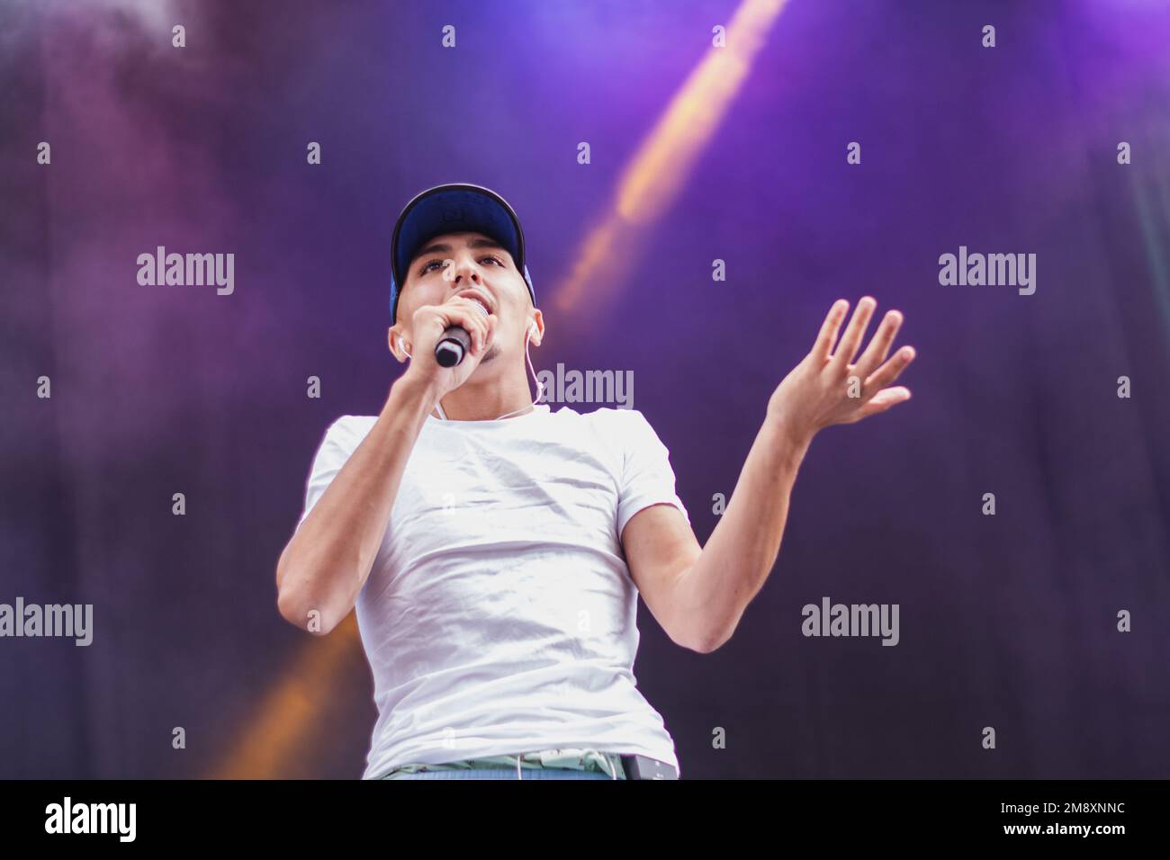 The singer and rapper Morad singing at the concert, 2021 Share Festival ...