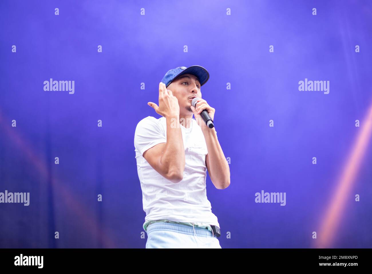 The singer and rapper Morad singing at the concert, 2021 Share Festival ...