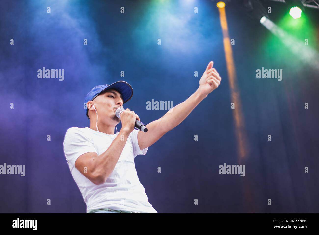 The singer and rapper Morad singing at the concert, 2021 Share Festival ...