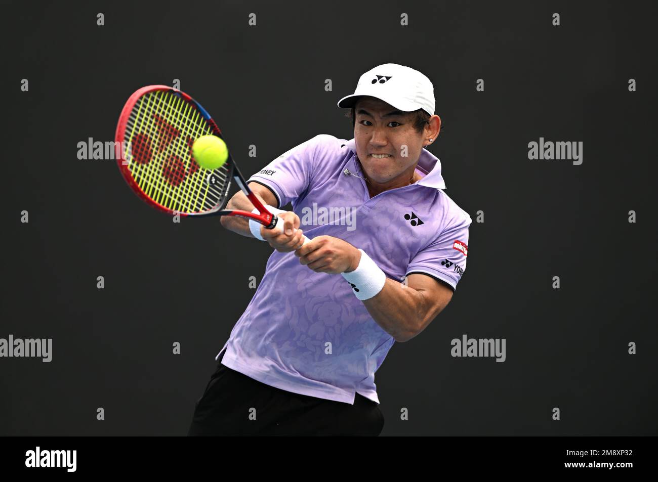 Yoshito Nishioka of Japan returns during his Men’s Singles 1st Round ...