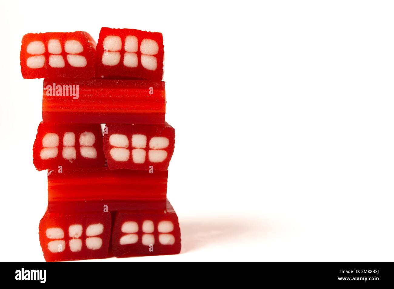 Stacked gummy bricks isolated on a white background Stock Photo - Alamy