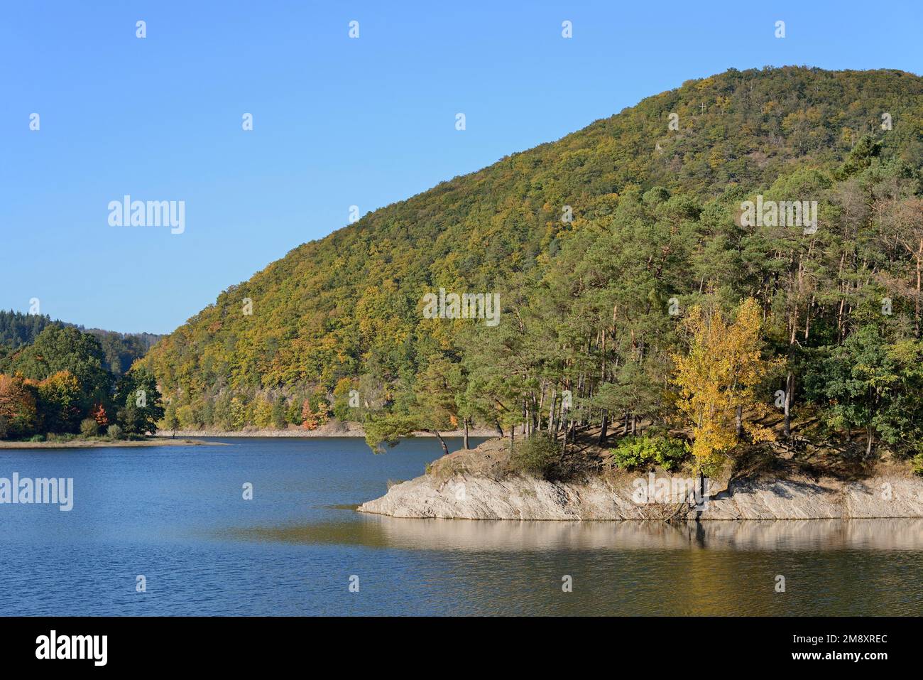 View over the Diemelsee in autumn, St. Muffert hilltop, mountain cross ...