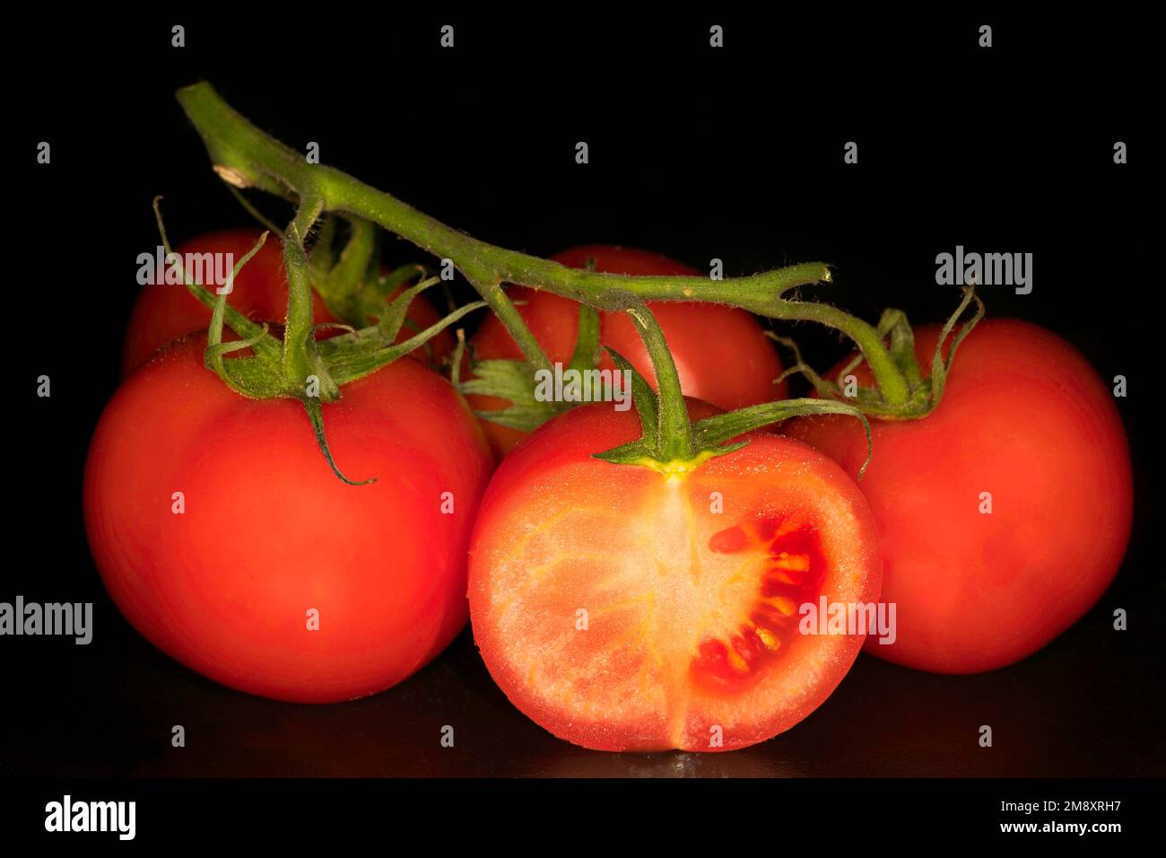 Fully ripe vine tomatoes (Solanum lycopersicum), food photography with ...