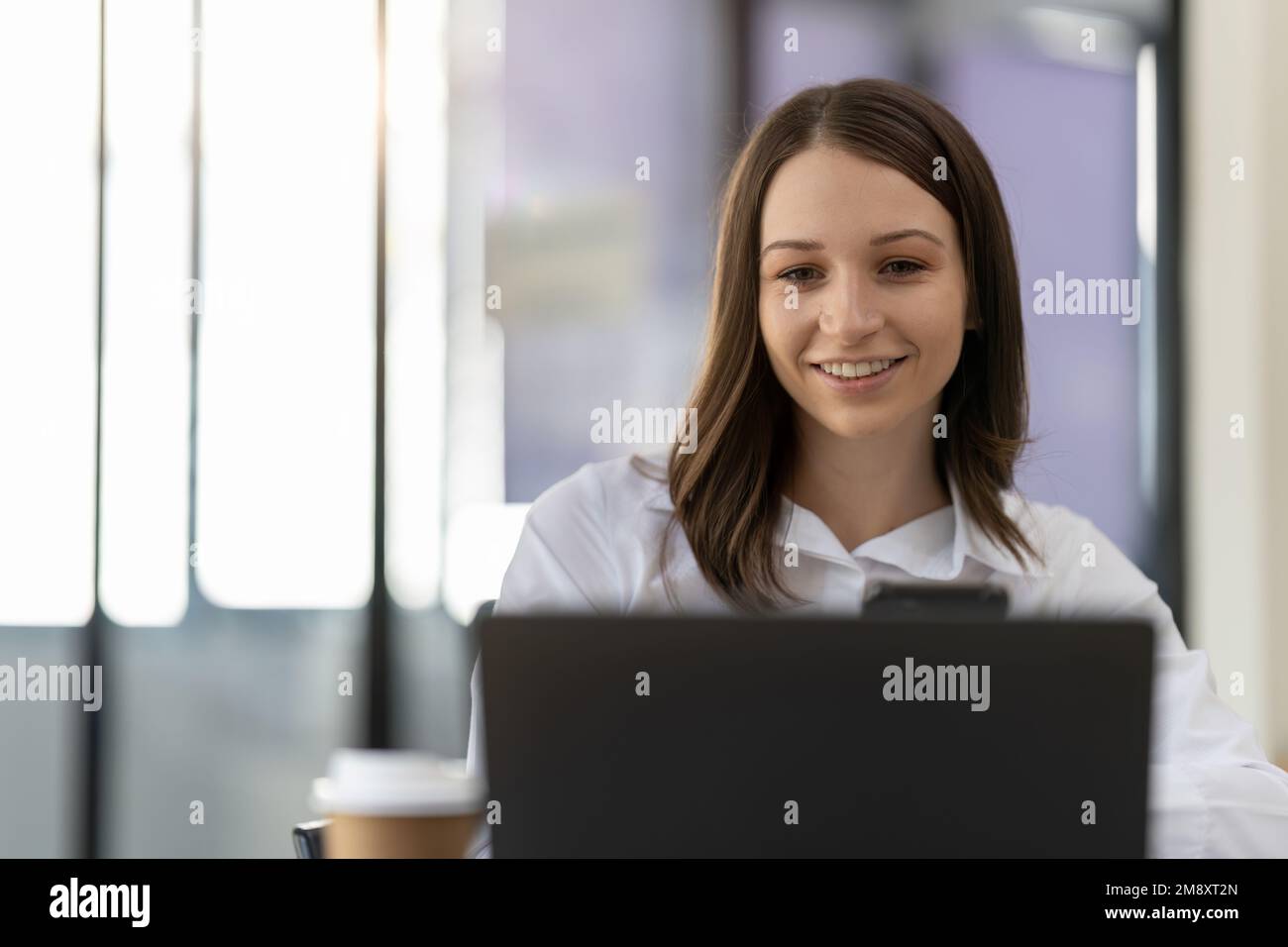 Portrait of smiling beautiful millennial businesswoman. happy female ...