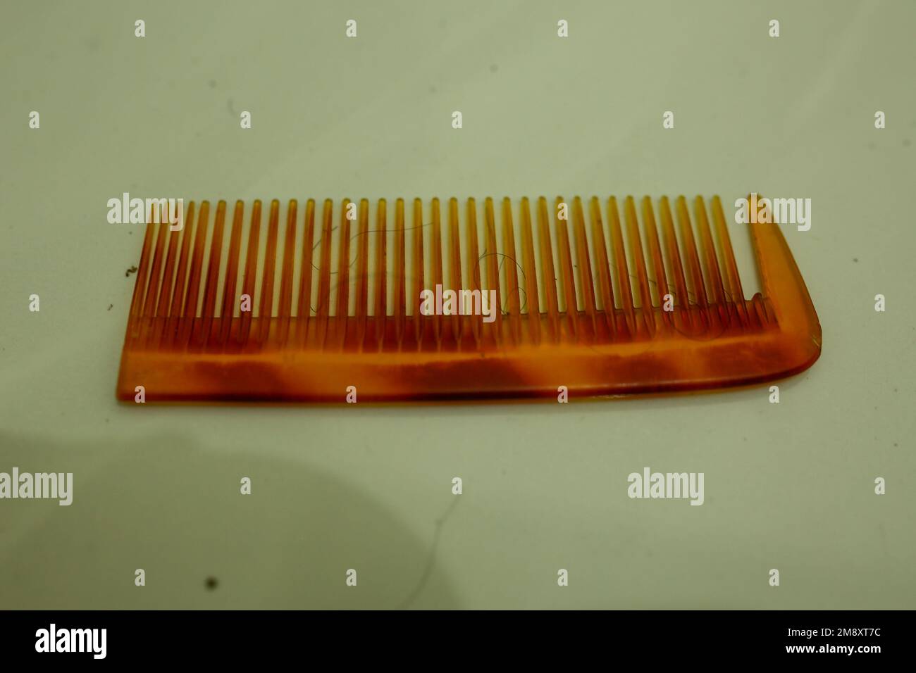 Broken comb hi-res stock photography and images - Alamy