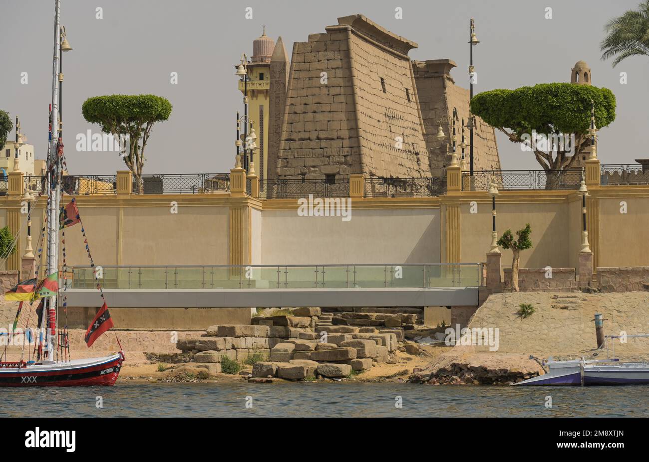 Nile bank, canal, pylon, ancient Egyptian Luxor temple, Luxor, Egypt ...