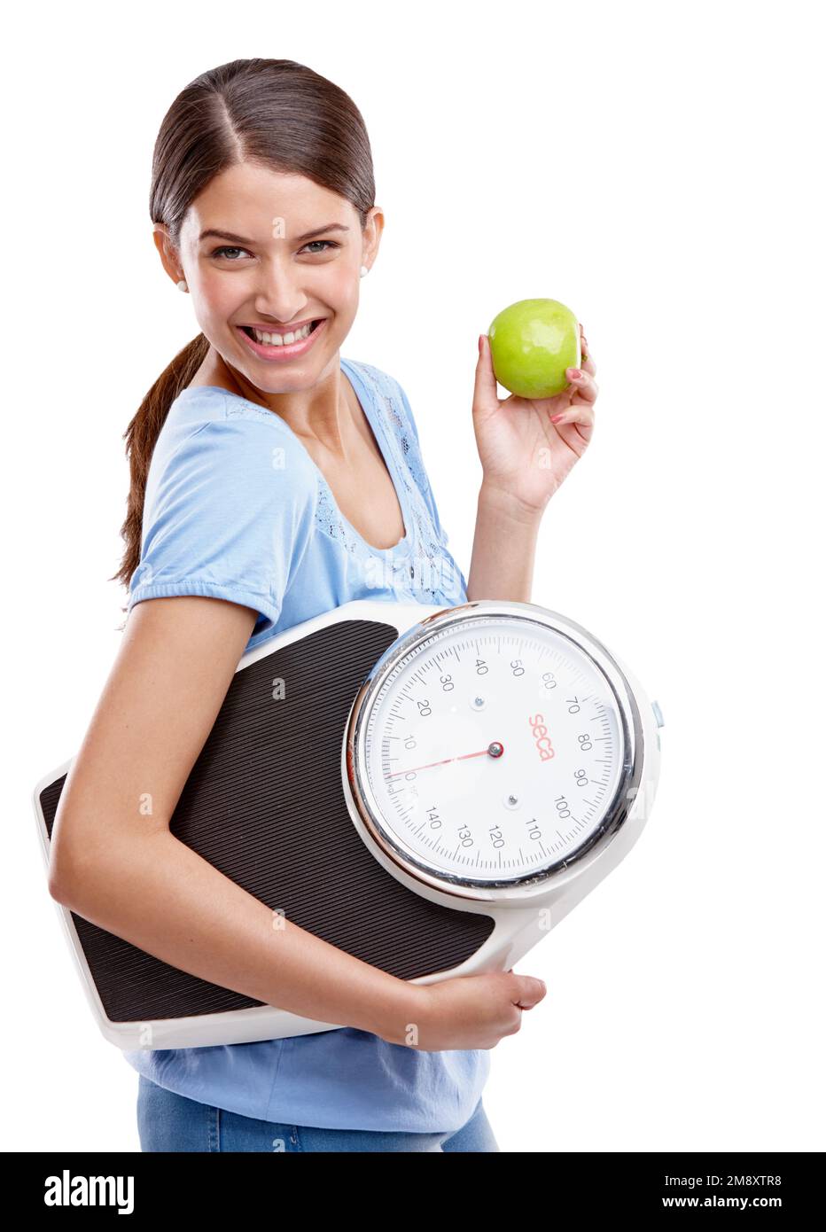 Apple, scale and diet of woman in studio isolated on white background ...