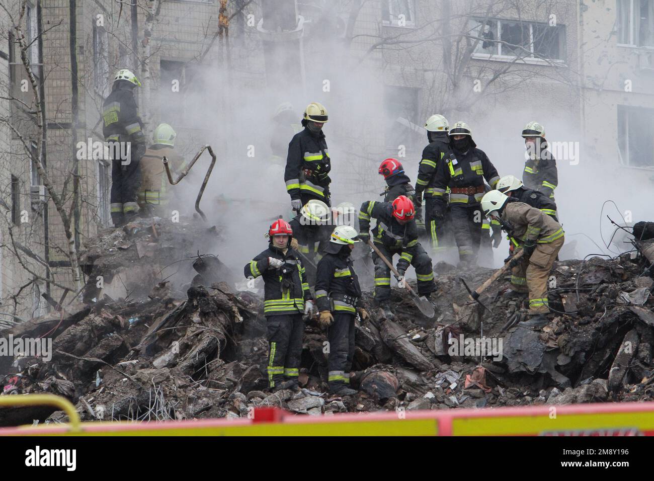Non Exclusive: DNIPRO, UKRAINE - JANUARY 15, 2023 - Rescuers remove the ...
