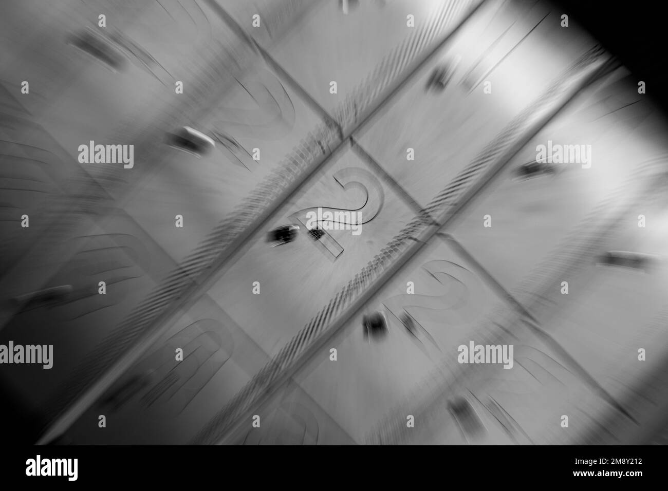 A Dutch angle of lockers with a zoom effect focusing on number "2" shot ...