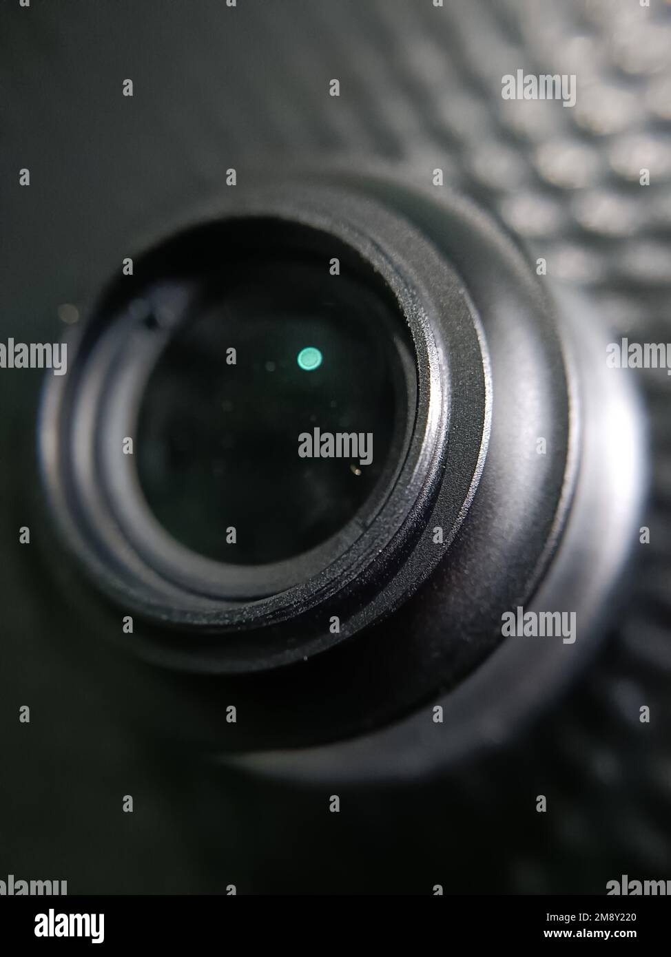 A vertical closeup of a professional camera lens Stock Photo - Alamy