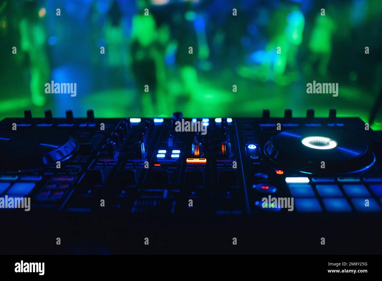 DJ mixer controller panel for electronic music in night club Stock ...