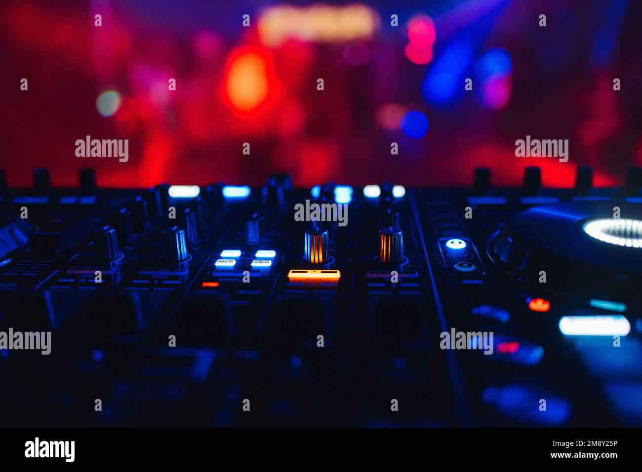 DJ mixer for mixing music and sound in a nightclub at a party Stock ...