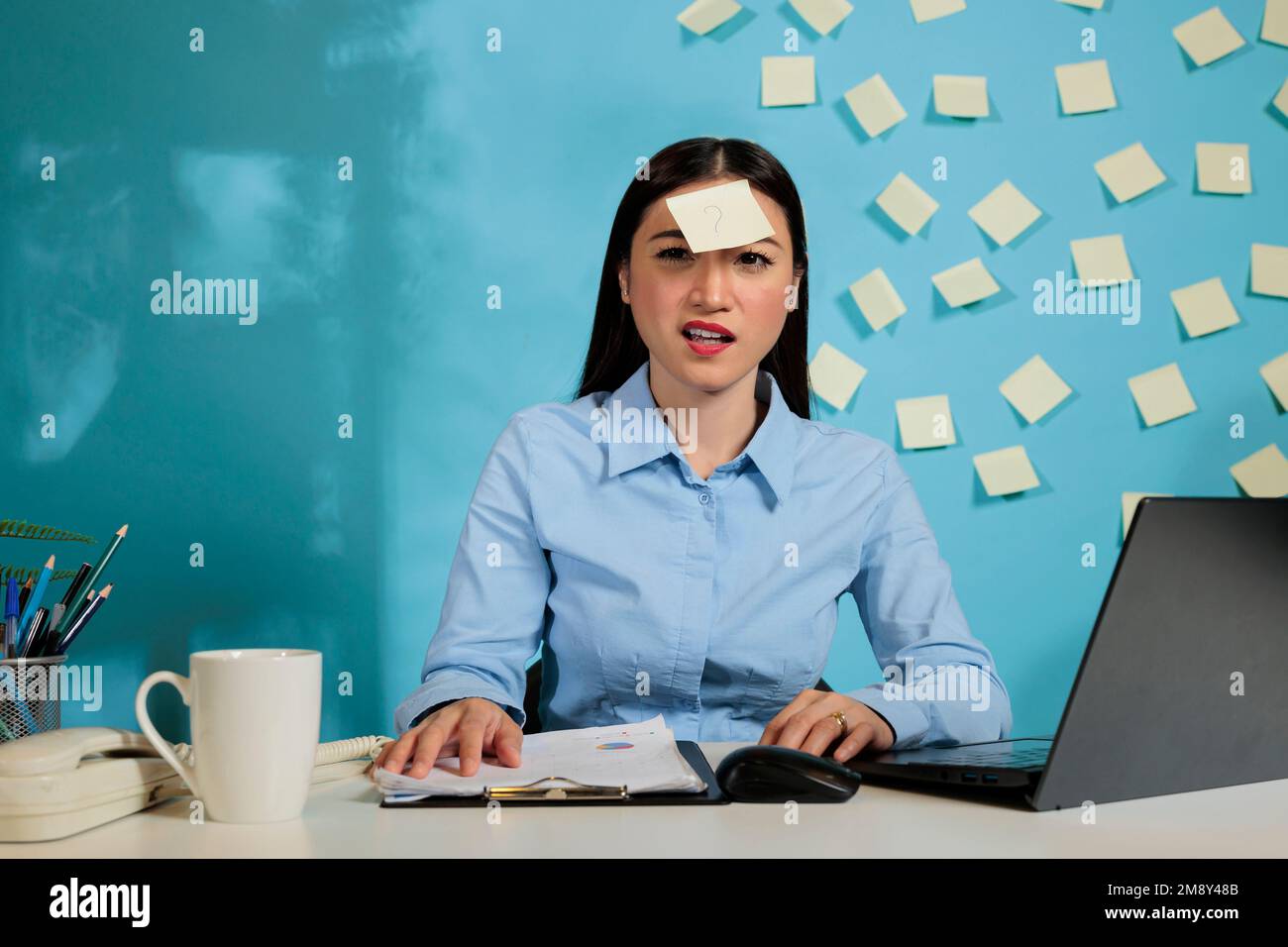 Office worker woman hesitant hi-res stock photography and images - Alamy