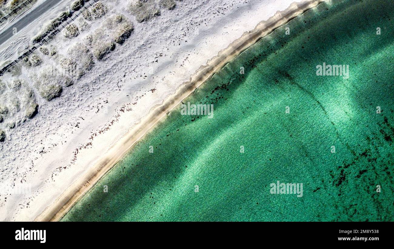 An aerial view of the shore of Ersfjord Beach, Senja Island, Norway ...