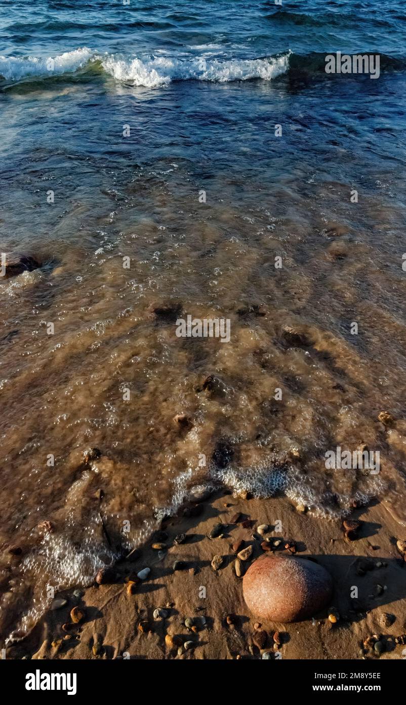 Waves lap on the Lake Superior Shore at Hurricane River Beach, Pictured ...