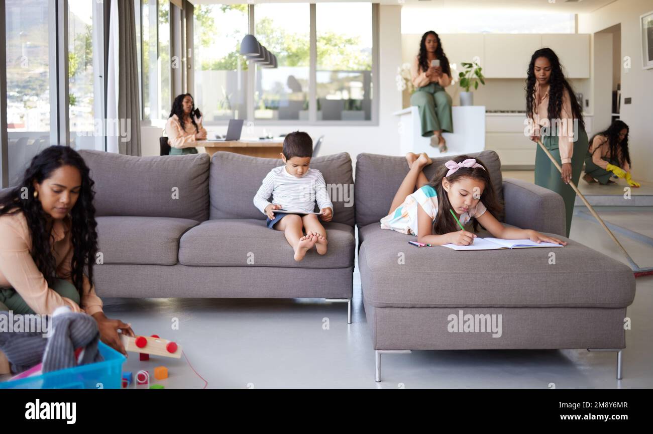 Theres lots to do. a young mother doing different tasks around the ...