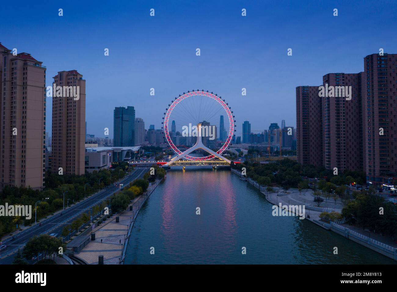 Tianjin yongle bridge ferris wheel hi-res stock photography and images ...