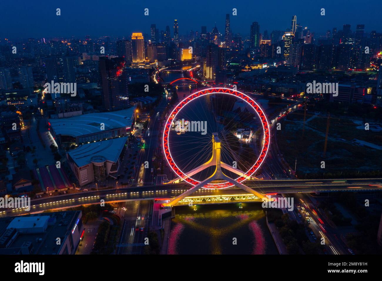 Tianjin yongle bridge ferris wheel hi-res stock photography and images ...