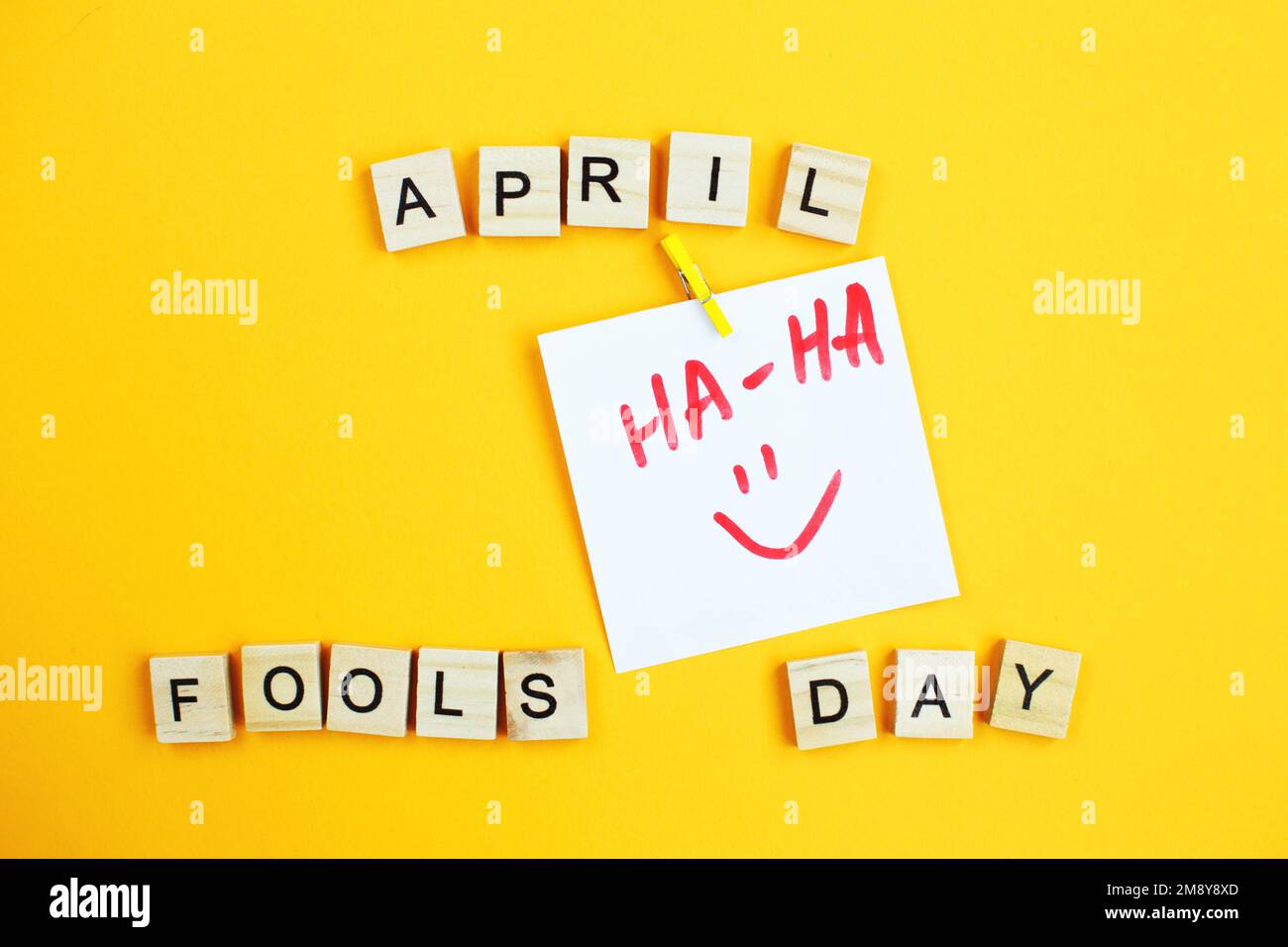 sticker with smiley hanging on the pin and the inscription april fools ...