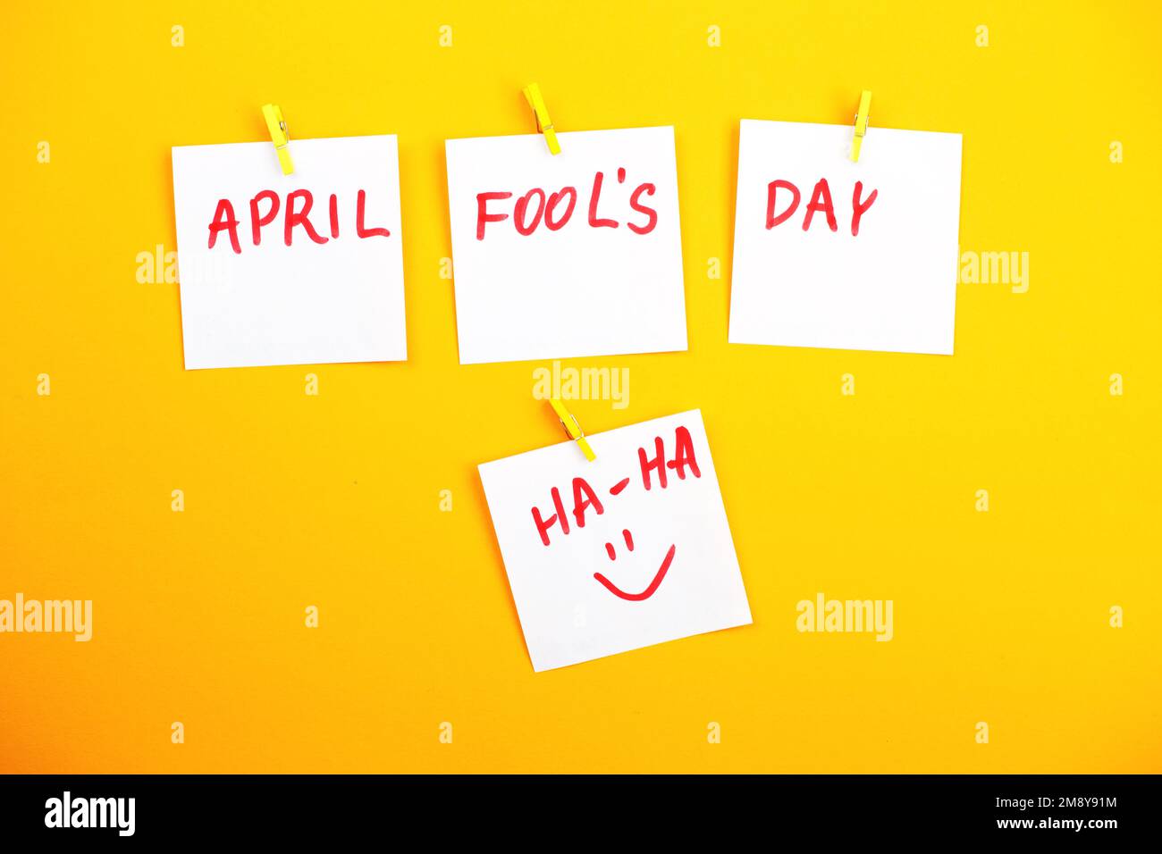 sticker with smiley hanging on the pin and the inscription april fools ...