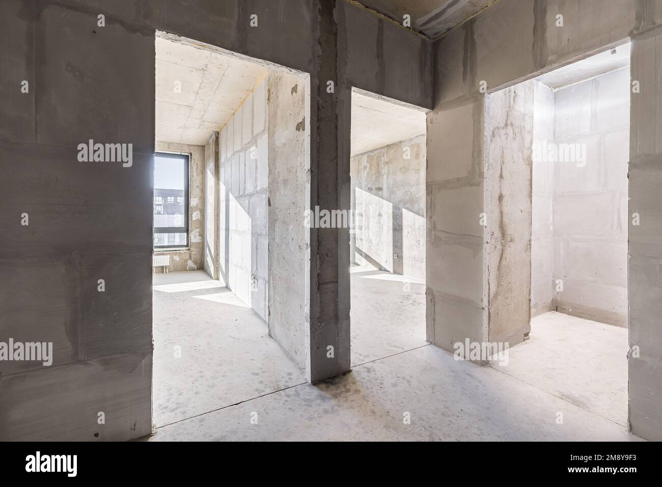 Empty concrete commercial space without finishing with partitions Stock ...