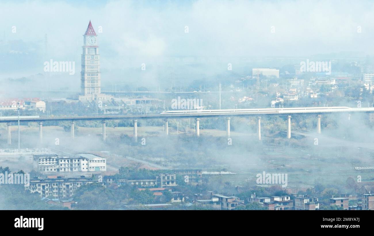 Aerial photo shows the high-speed train galloping on the Ganjiang Grand ...