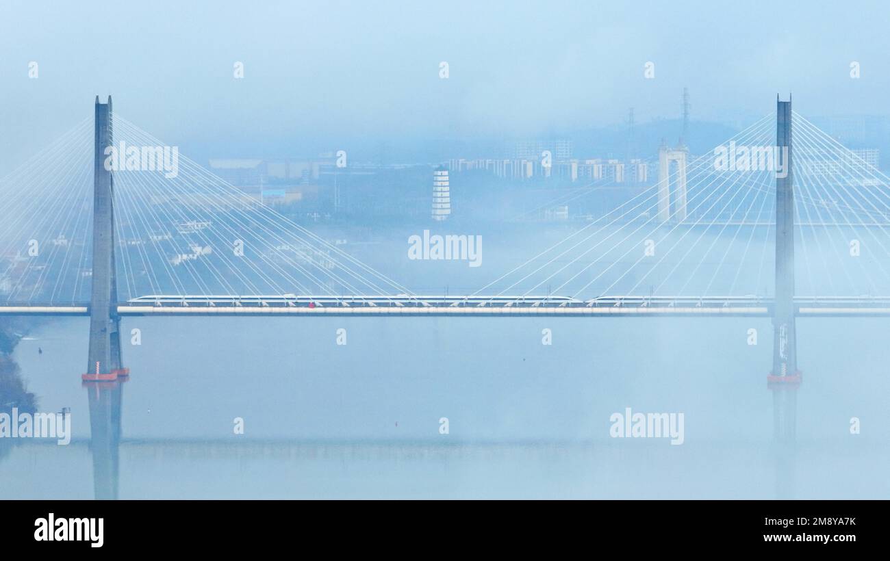 Aerial photo shows the high-speed train galloping on the Ganjiang Grand ...
