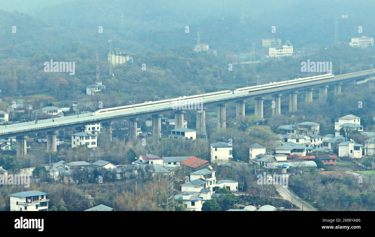 Aerial photo shows the high-speed train galloping on the Ganjiang Grand ...
