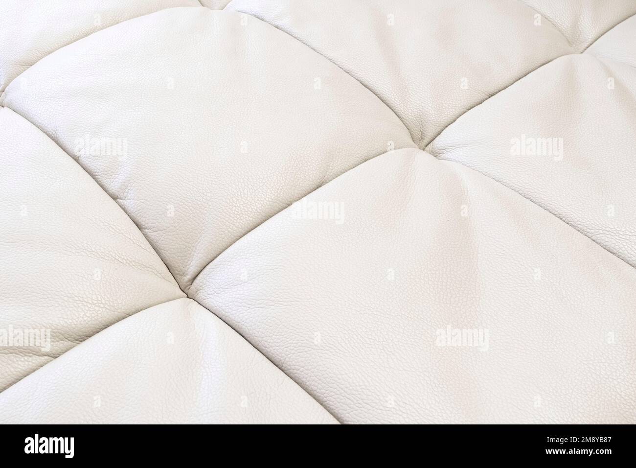 White leather texture. Part of perforated leather details. Orange ...