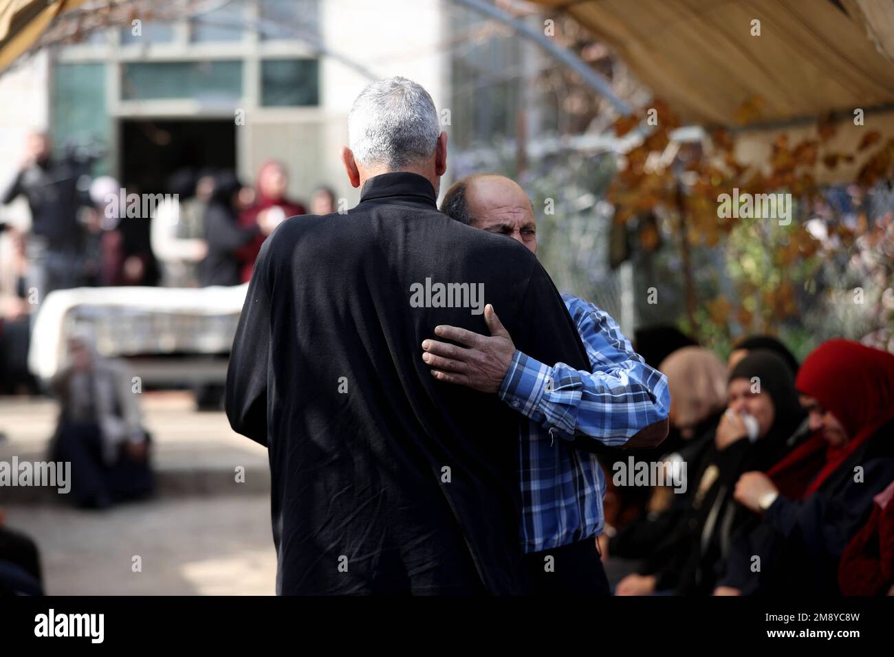 Ramallah, West Bank city of Ramallah. 15th Jan, 2023. People mourn ...