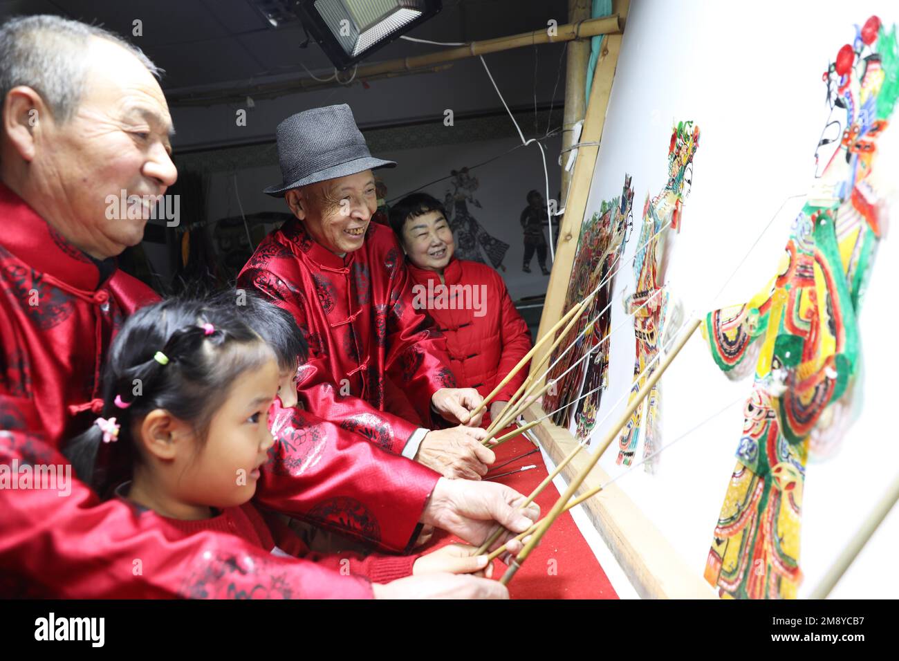 Children experience shadow puppetry in the cultural museum of Fengrun ...