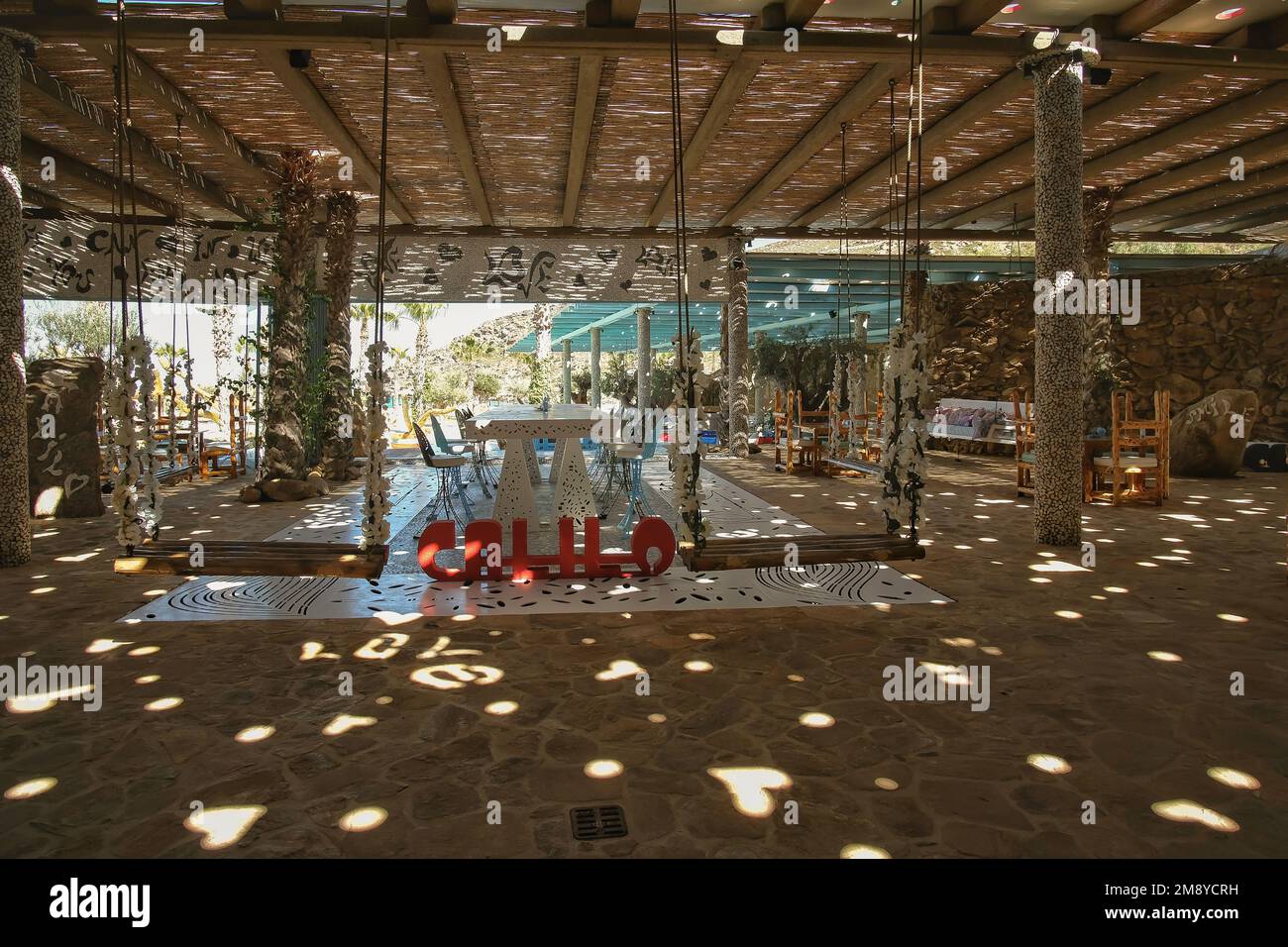 Ios, Greece - June 6, 2021 : View of an outdoor restaurant of a luxury ...
