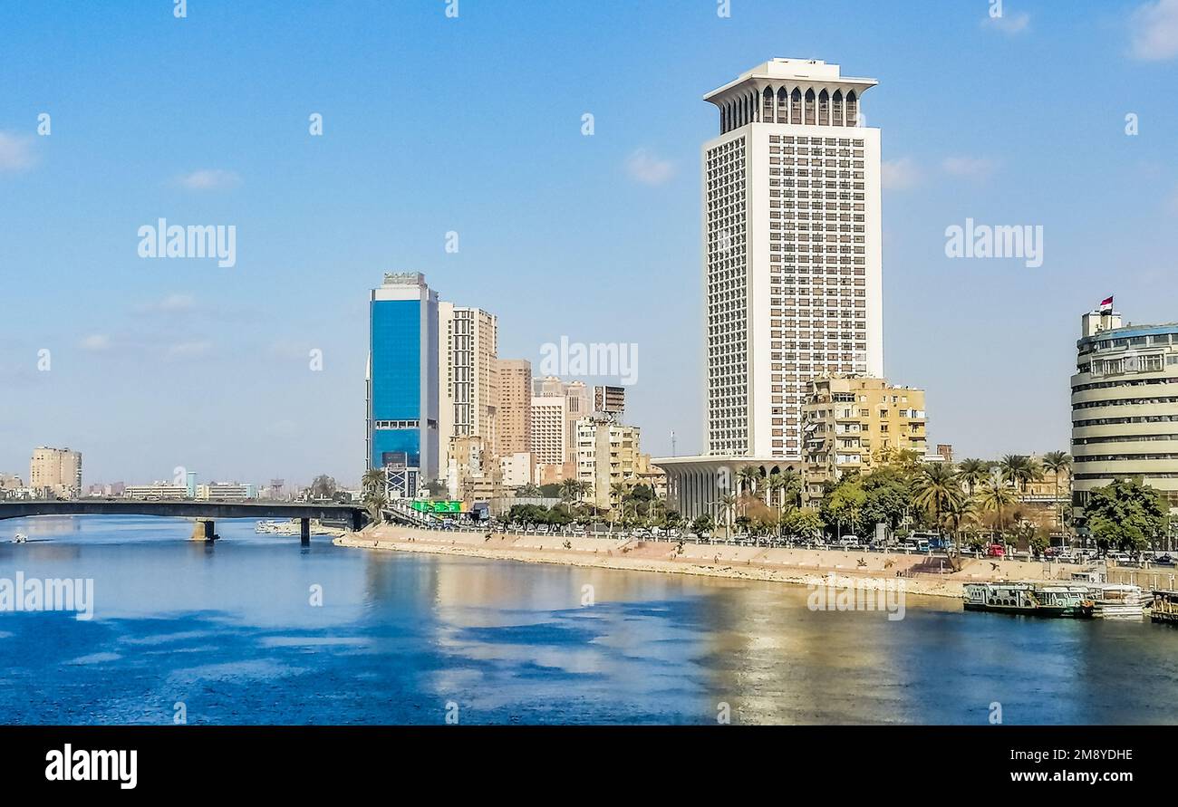 A beautiful morning view of modern buildings from a Nile river shore in ...