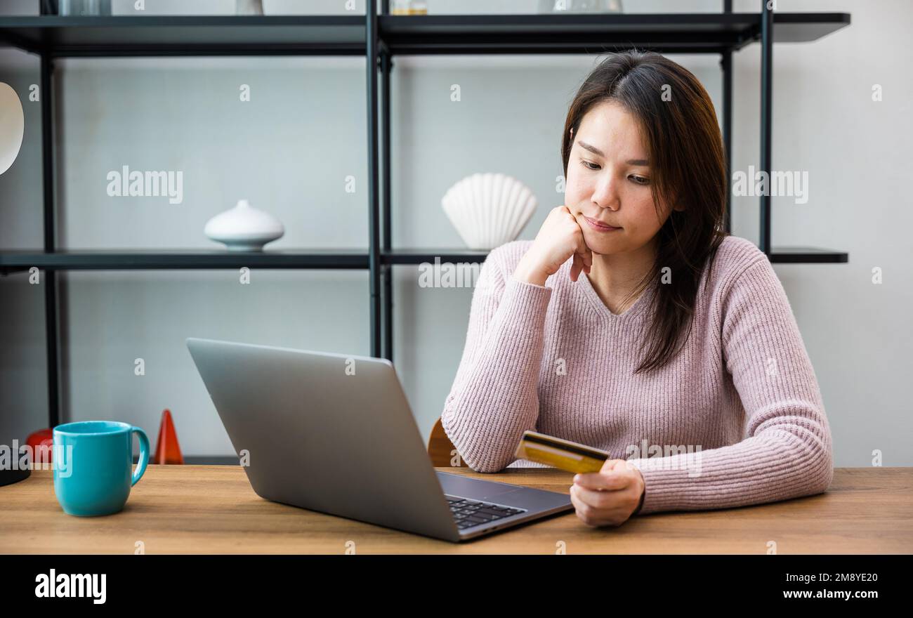 Business woman worried serious think or ponder before write email to ...