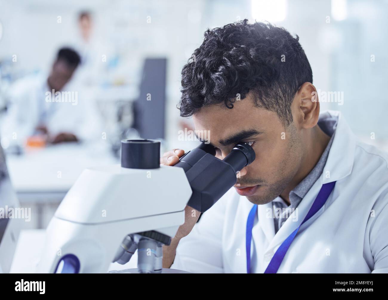Hes onto the next mission. a young male lab technician using a ...