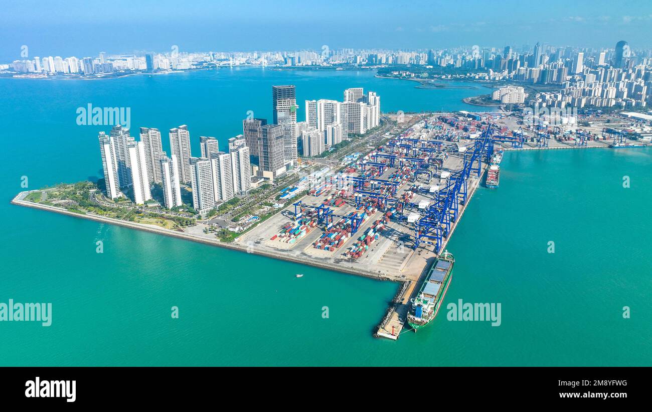 Aerial photo shows the busy container terminal at Haikou Port in Haikou ...