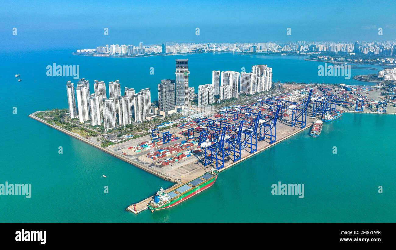 Aerial photo shows the busy container terminal at Haikou Port in Haikou ...