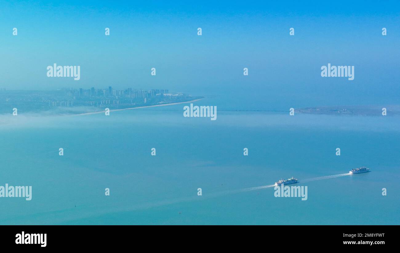 Aerial photo shows the busy container terminal at Haikou Port in Haikou ...