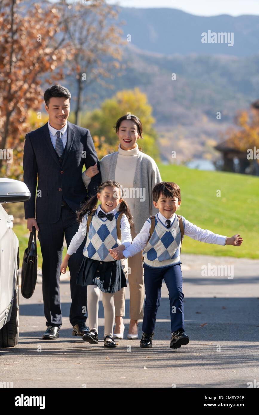 A young couple to send their children to school Stock Photo - Alamy