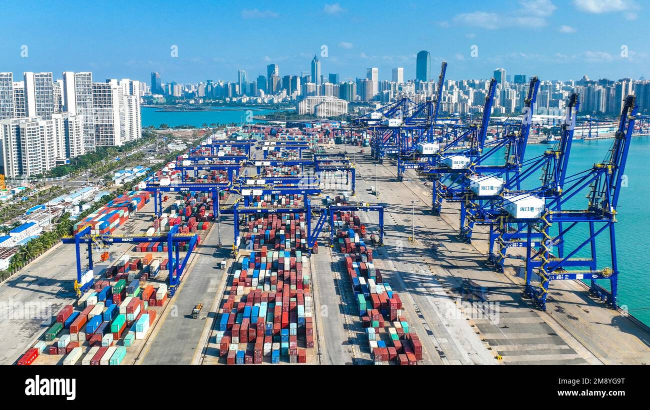 Aerial photo shows the busy container terminal at Haikou Port in Haikou ...