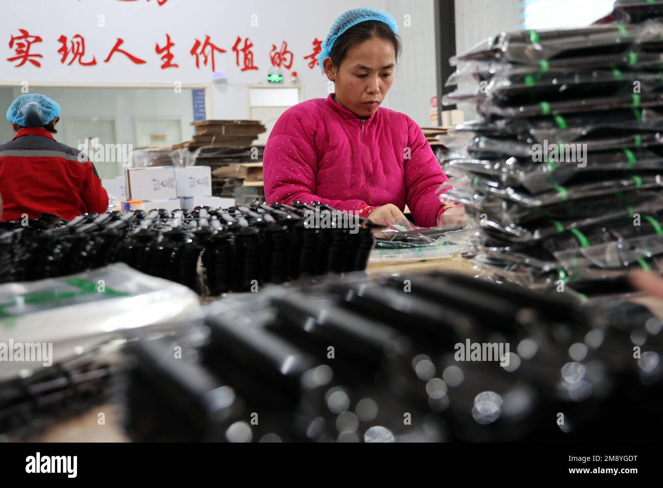Plastic in chinese factory hi-res stock photography and images - Alamy