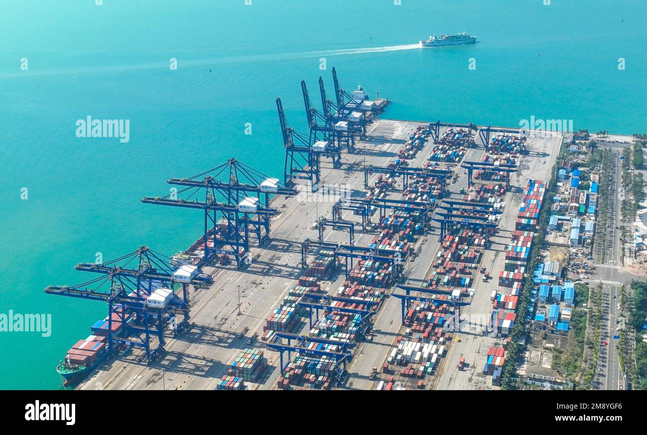 Aerial photo shows the busy container terminal at Haikou Port in Haikou ...
